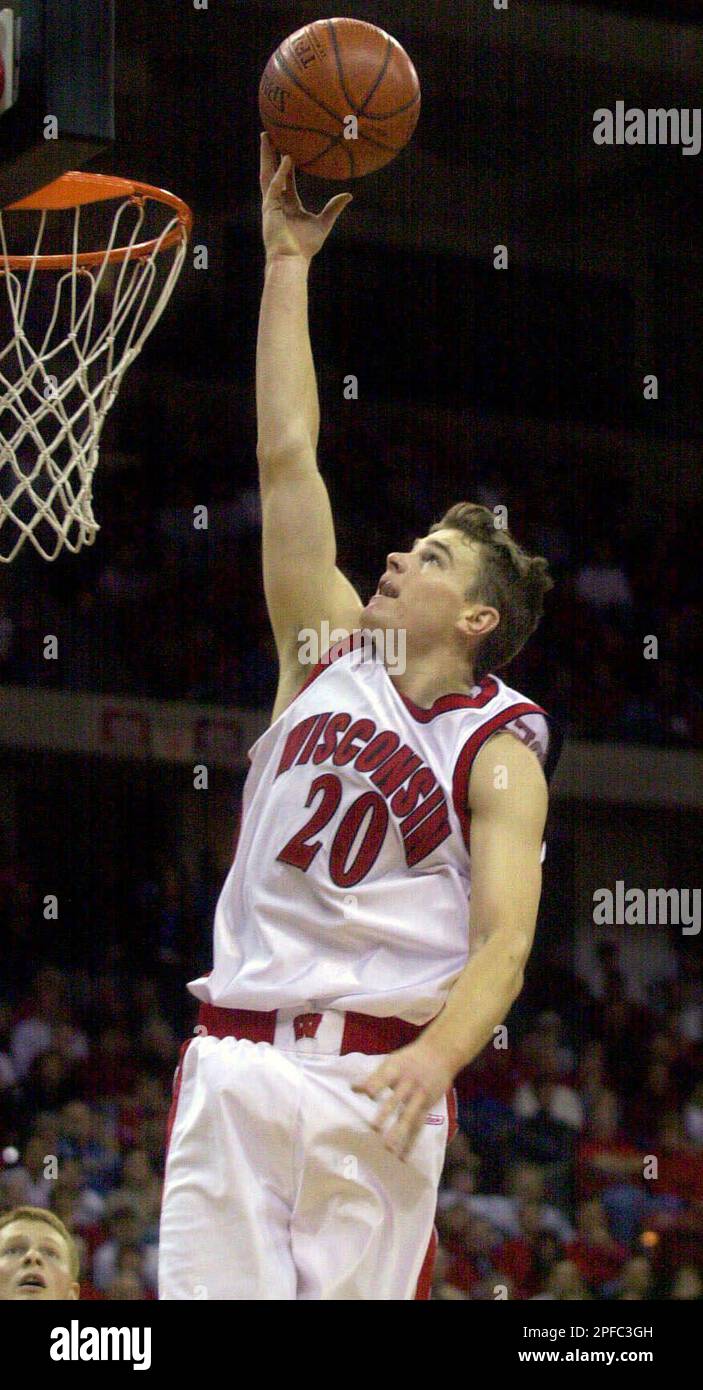 Wisconsin's Kirk Penney scores on a fast break during the first half of ...