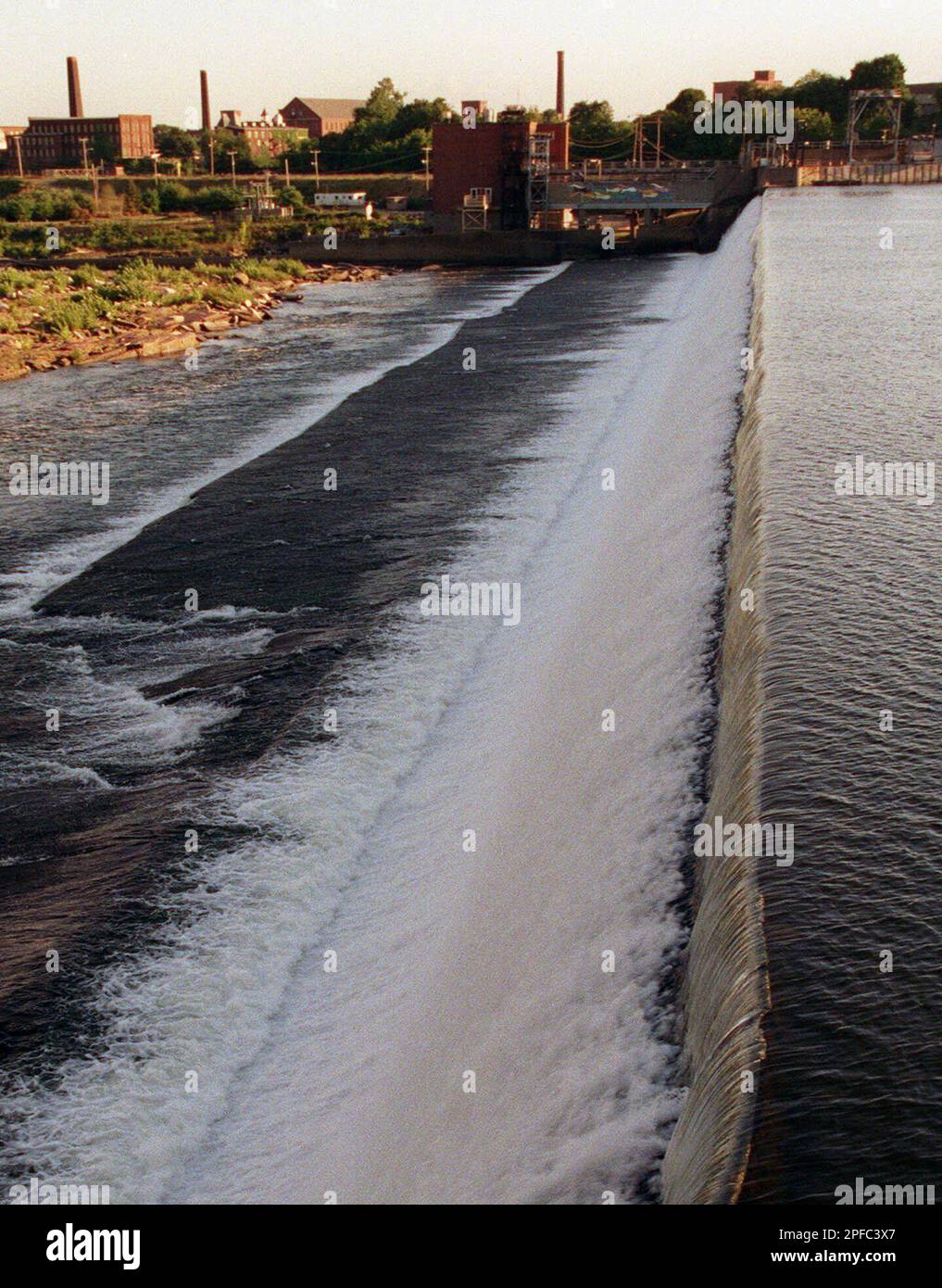 Water from the Connecticut River rushes over the Holyoke Dam, Monday ...