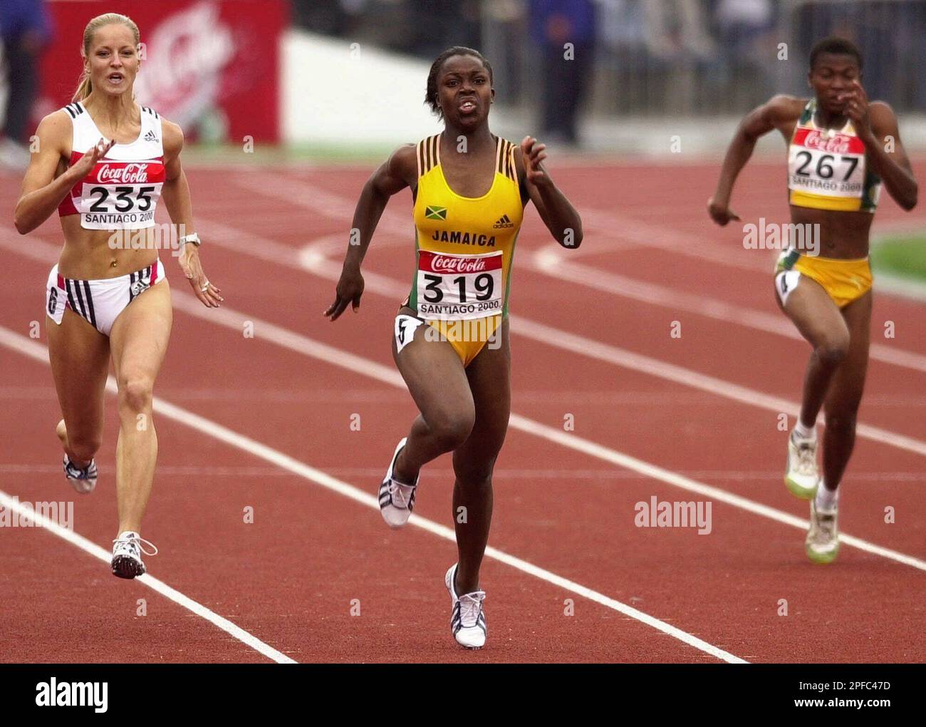 Jamaica's Veronica Campbell, center, competes with Germany's Sina ...