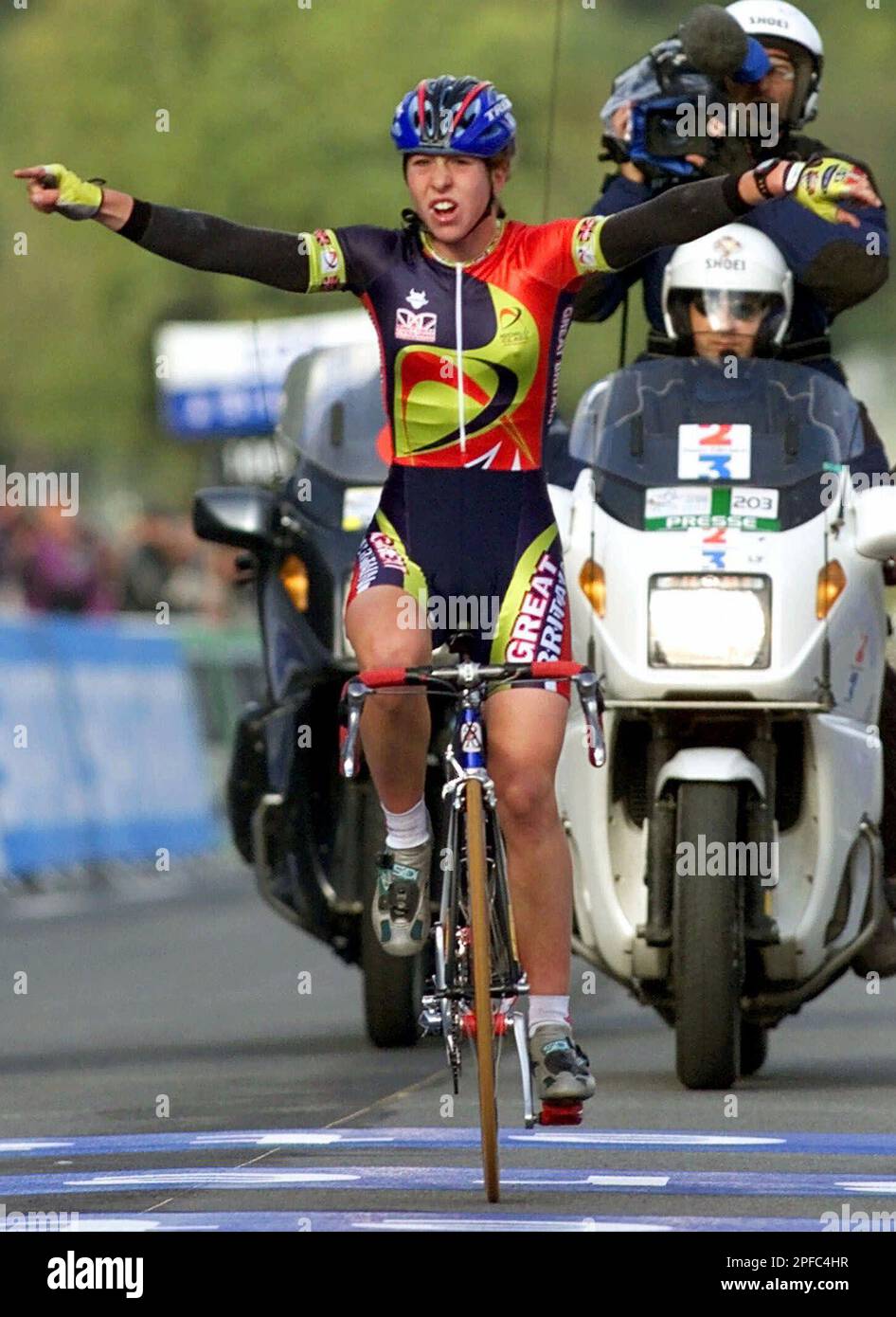 Nicole Cooke of Great Britain reacts as she crosses the finish line to ...