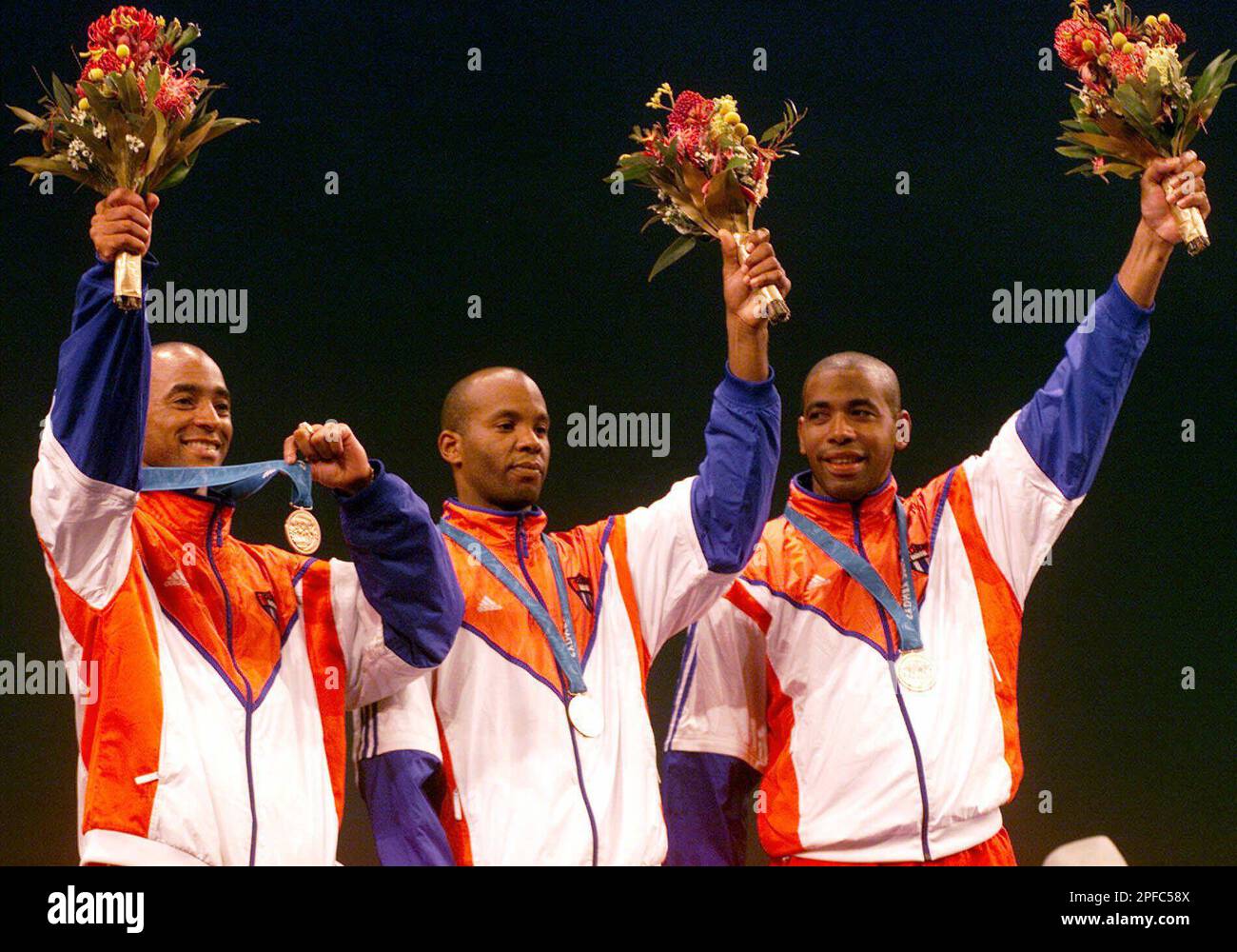Cuban men's epee team celebrate with bronze medal after they defeated ...
