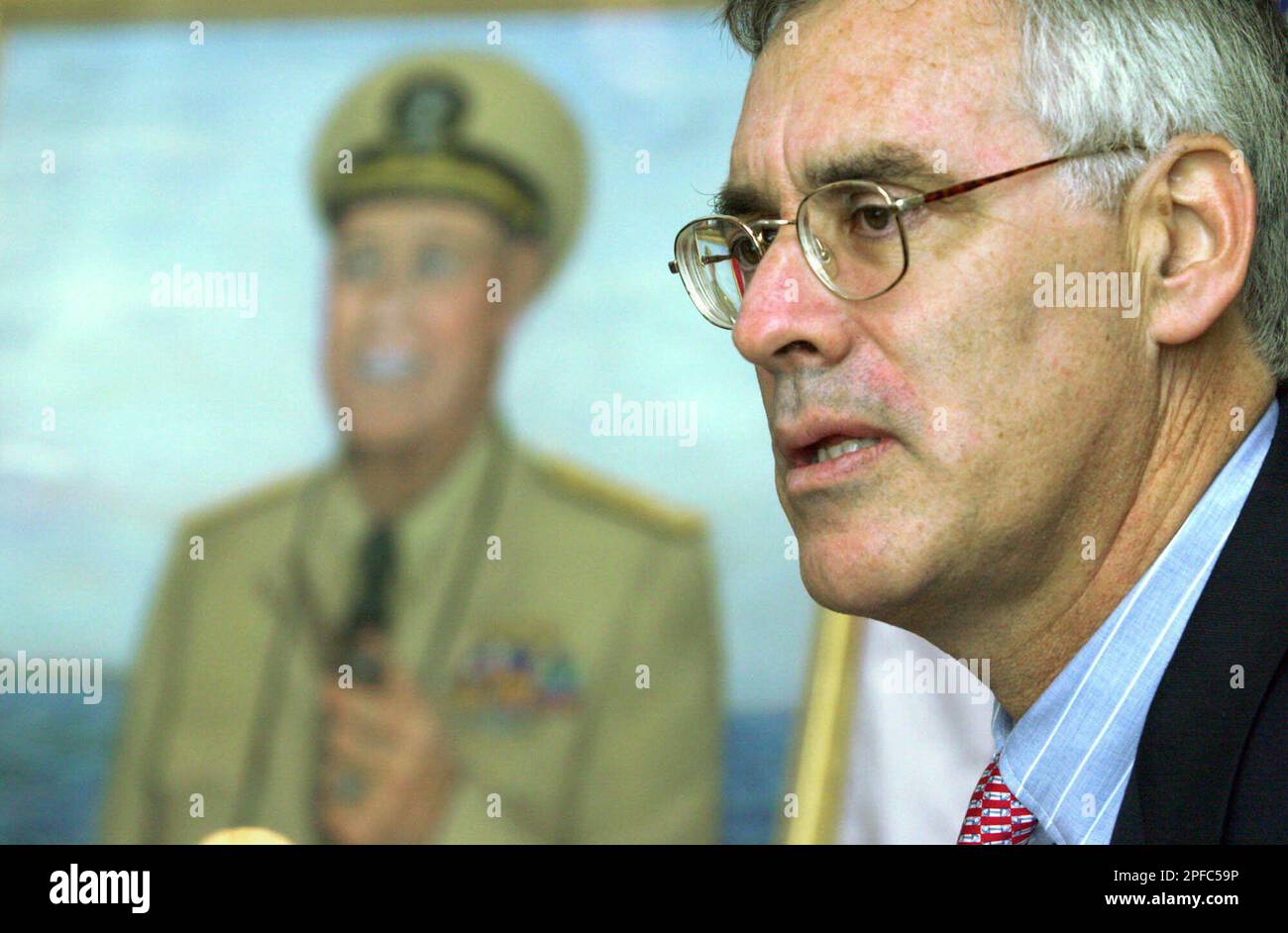 Secretary of the Navy Richard Danzig, right, announces that former Navy ...