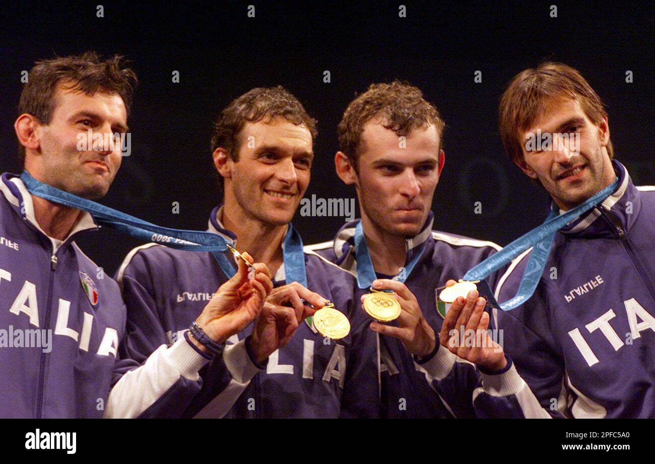 Italian men's epee team celebrate with gold medal after beating France ...