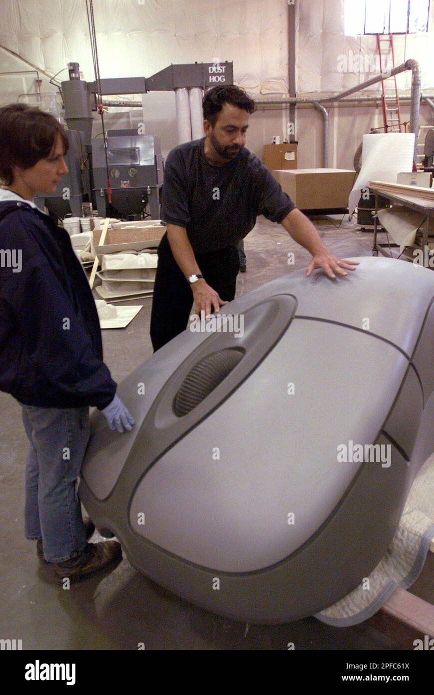 Mike Dillon, president of Dillon Works, right, talks about the planned ...