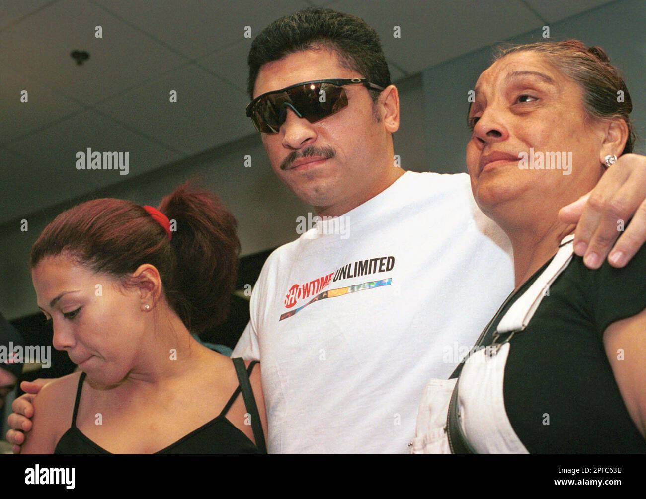 Heavyweight contender John Ruiz of Chelsea, Mass., stands with his wife ...