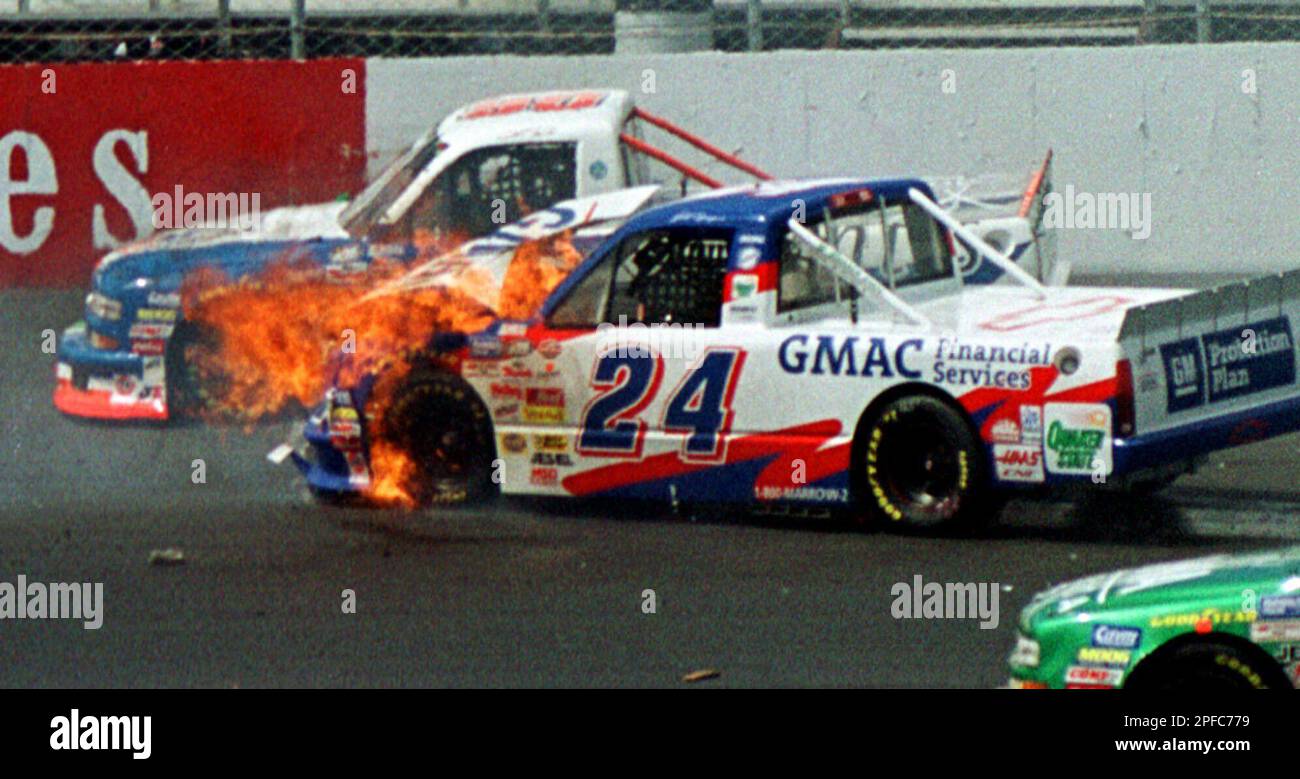 Jack Sprague (24) of Spring Lake, Mich., slams into Lance Norick of ...