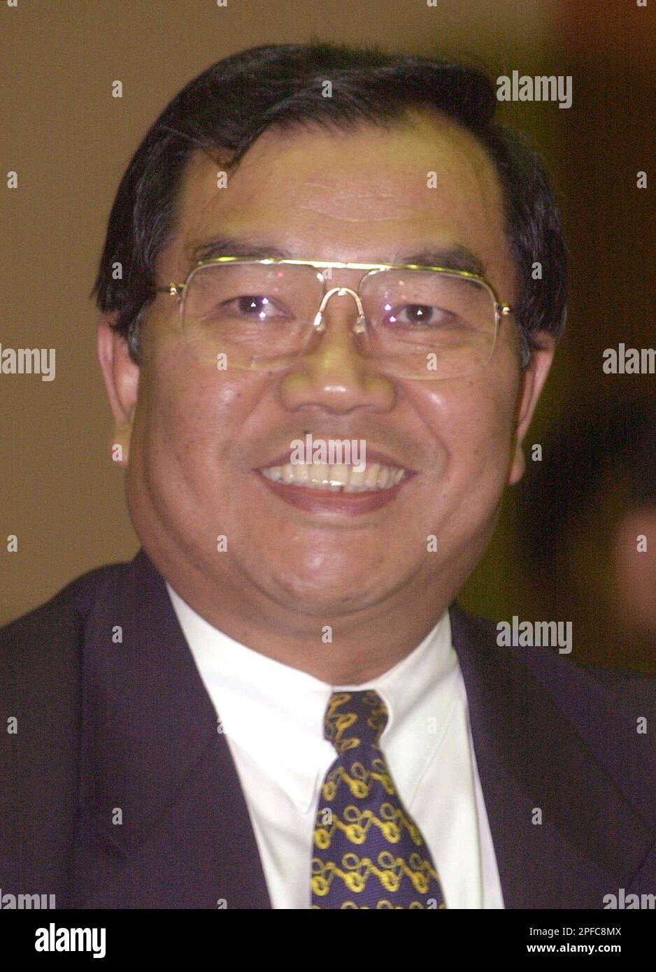 Indonesian central bank governor Sjahril Sabirin smiles as he is ...