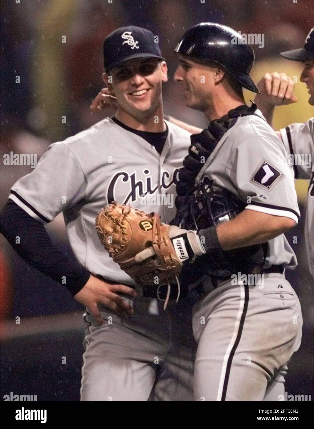 Chicago White Sox relief pitcher Keith Foulke, left, is all smiles as ...