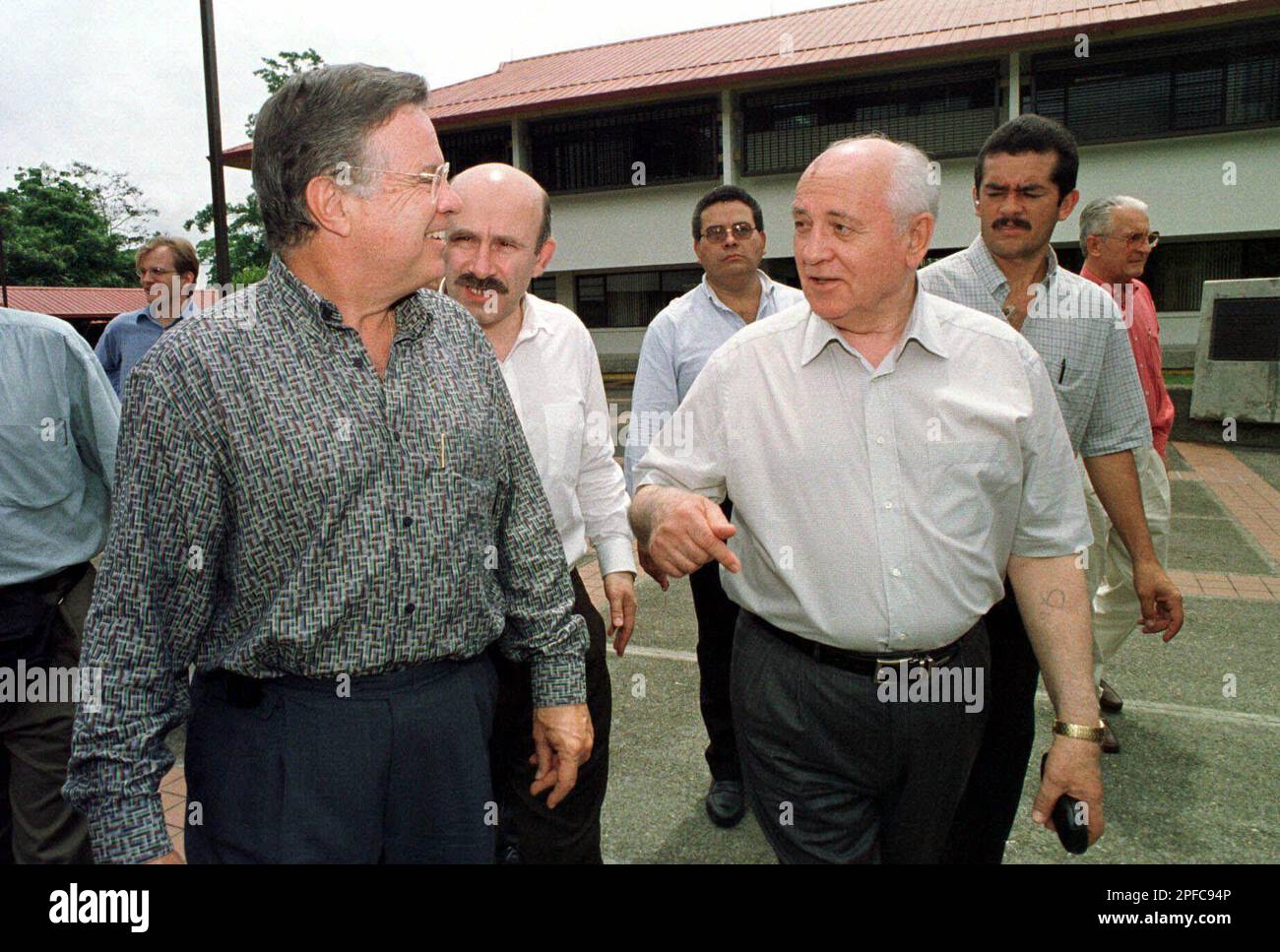 Costa Rica President Miguel Angel Rodriguez, right, talks with former ...