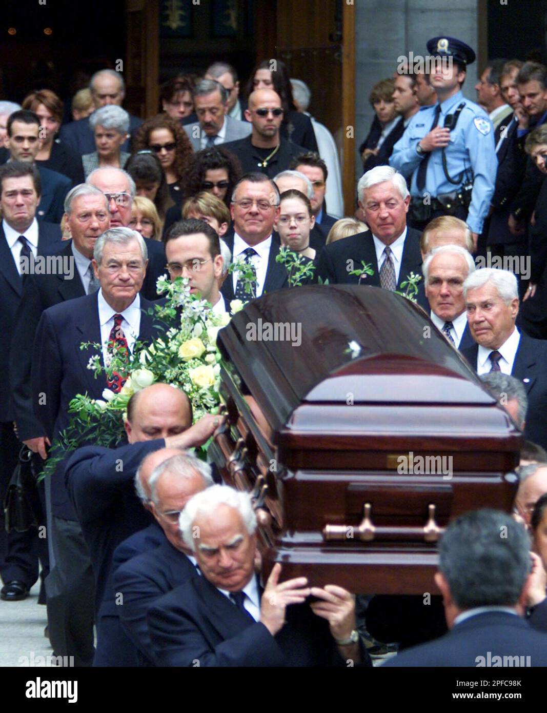 Family members and friends follow the casket of Maurice (Rocket ...