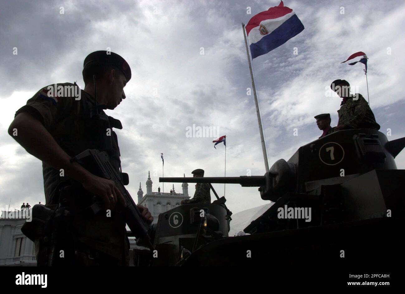 Military personnel display tanks during a military parade commemorating ...