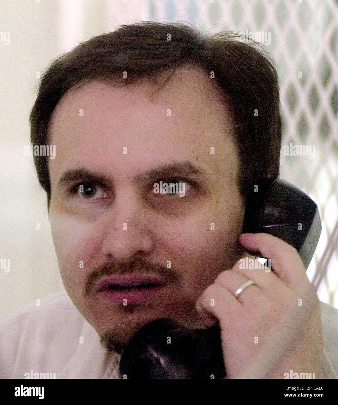 Texas death row inmate Michael McBride talks on an intercom at Texas ...