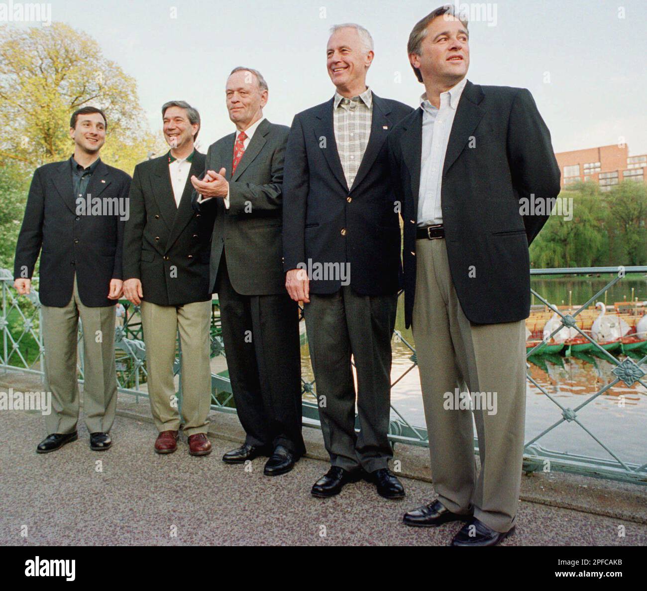 Canadian Prime Minister Jean Chretien, center, joins a rare gathering ...