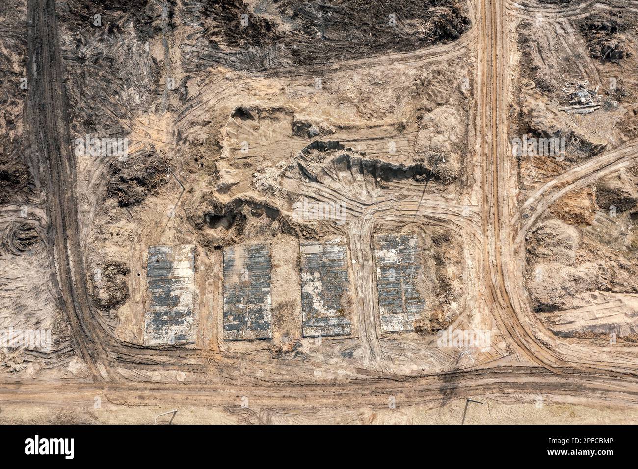 aerial top view of construction site during the earthworks. leveling of ...
