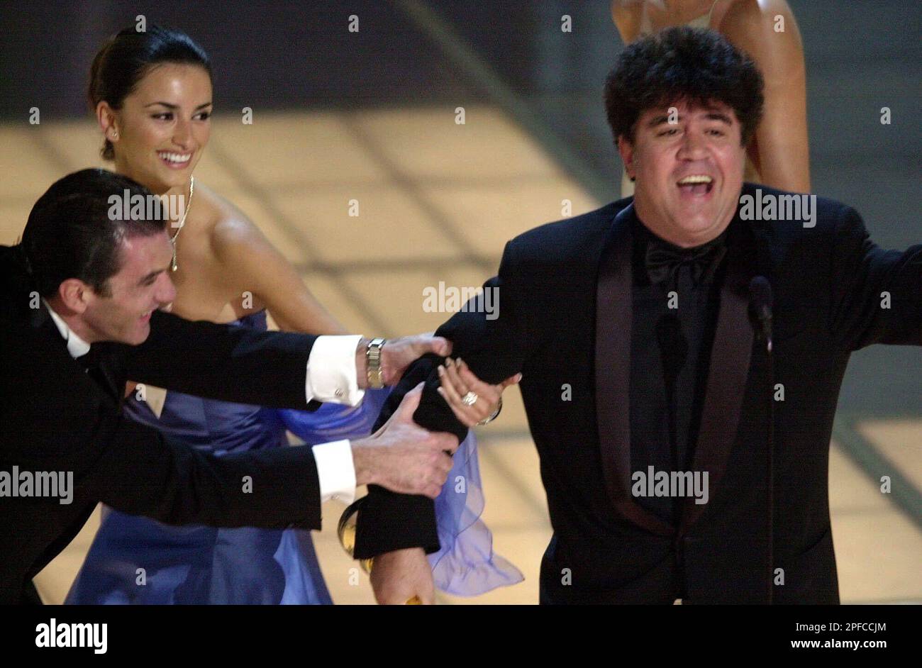 Spanish director Pedro Almodovar is yanked off stage by presenter ...