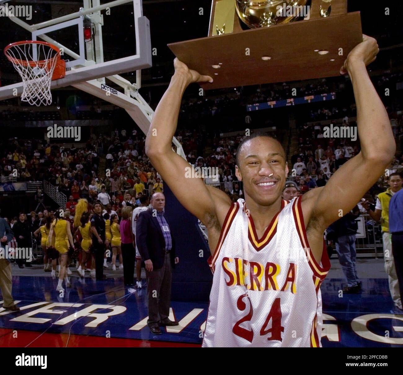 Sierra's Shalamar Jordan smiles as he carries the team's championship ...