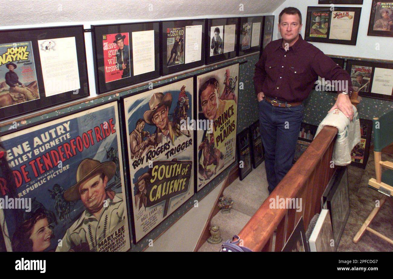 Scott Stutesman, with some of his autographed western movie posters and ...