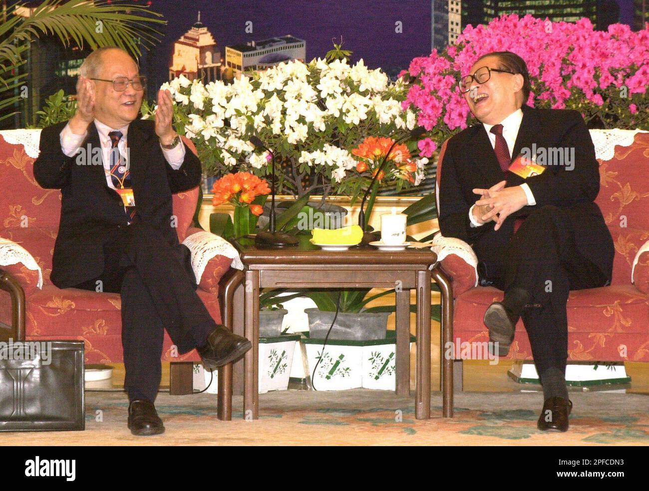 Chinese President Jiang Zemin, right, laughs during a meeting with head ...
