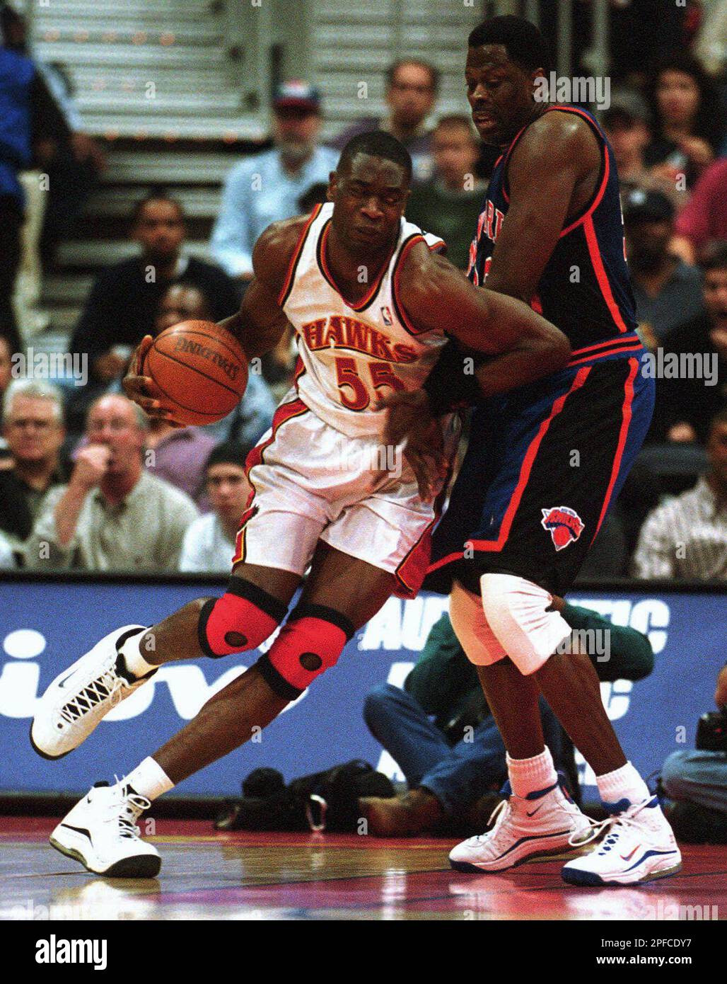 Atlanta Hawks' Dikembe Mutombo tries to muscle into the lane against ...