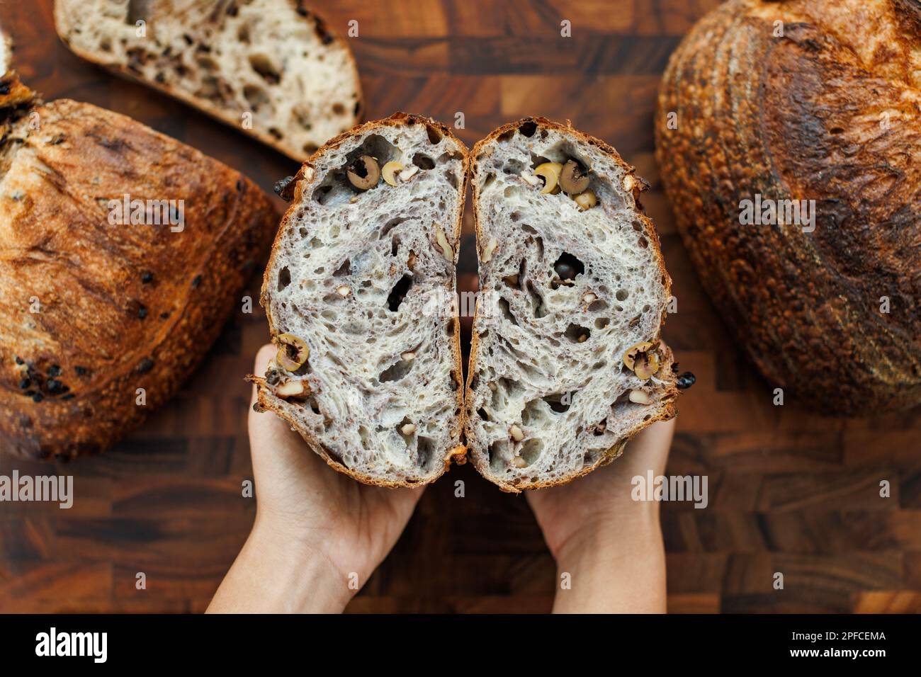 Artisan bread. Homemade Sourdough bread with olives. Top view showing ...