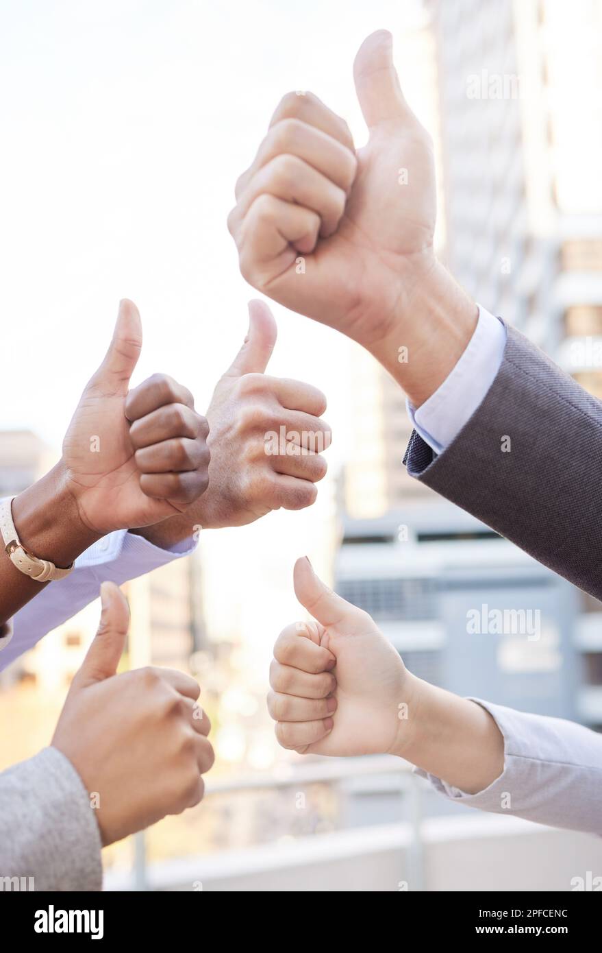 The symbol of success. an unrecognisable group of businesspeople ...