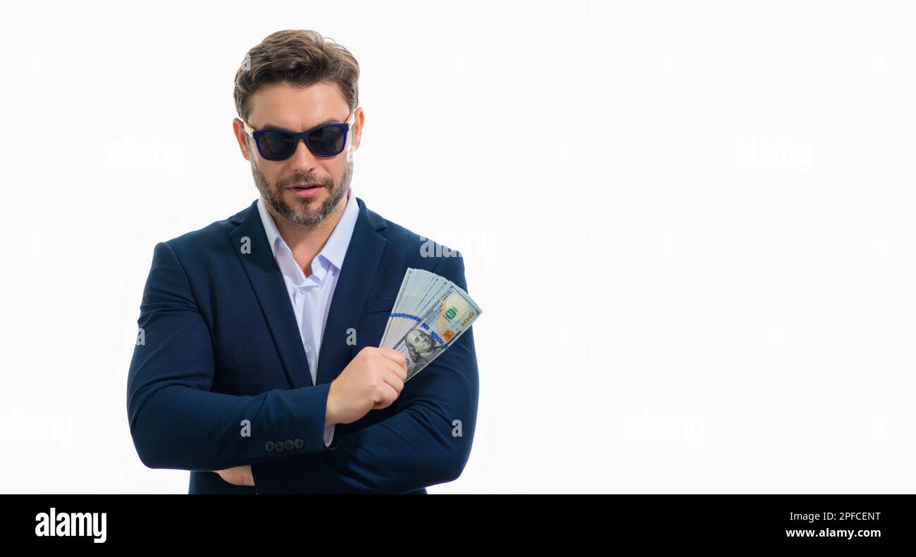 Man in suit with money cash. Dollar banknotes. Portrait of man holding ...
