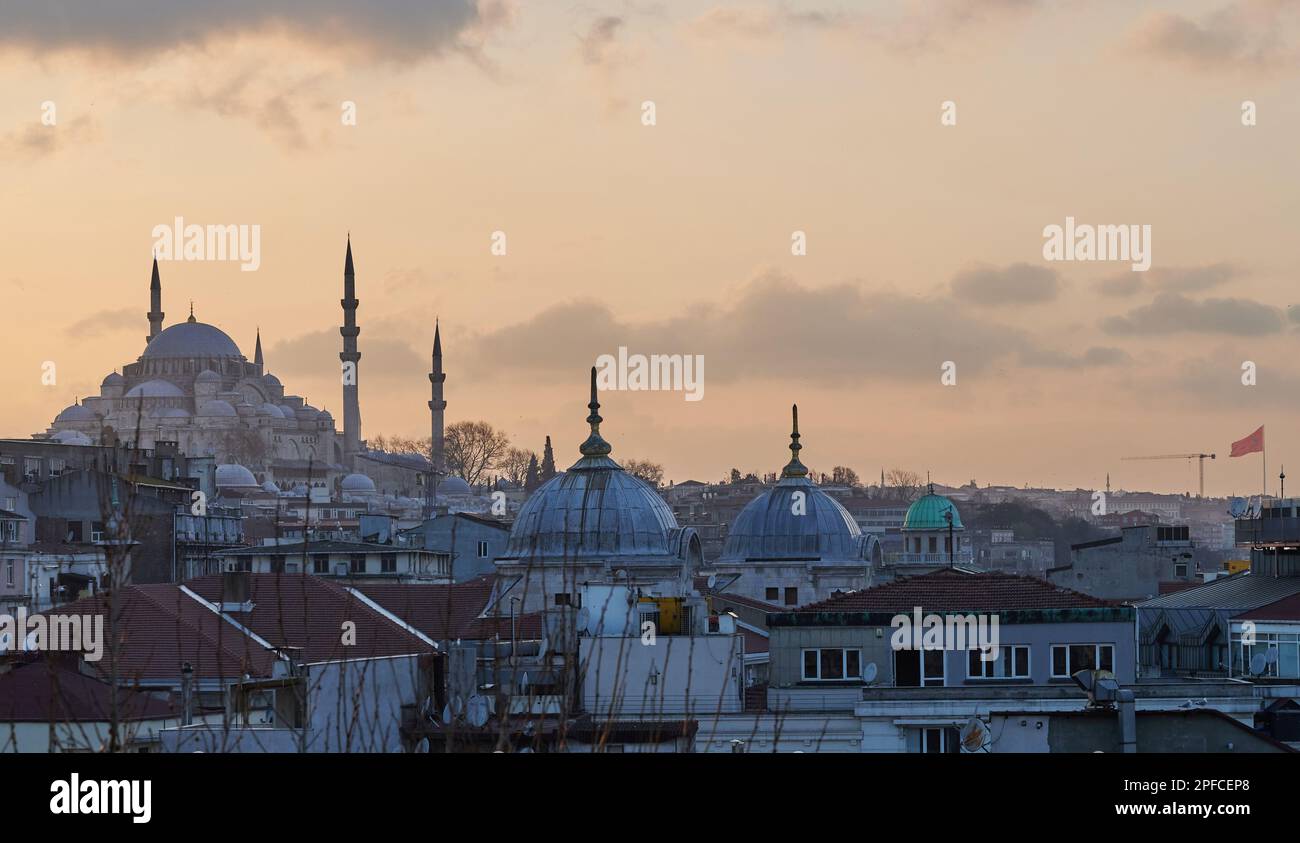 Rooftop in Istanbul on sunset light with mosque background Stock Photo ...