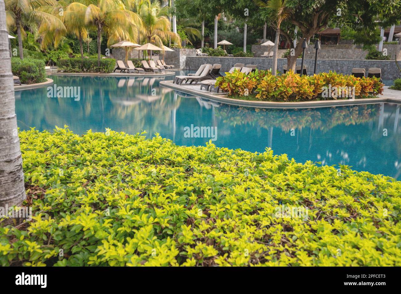 Big pool in tropical nature. Paradise spa hotel resort Stock Photo - Alamy
