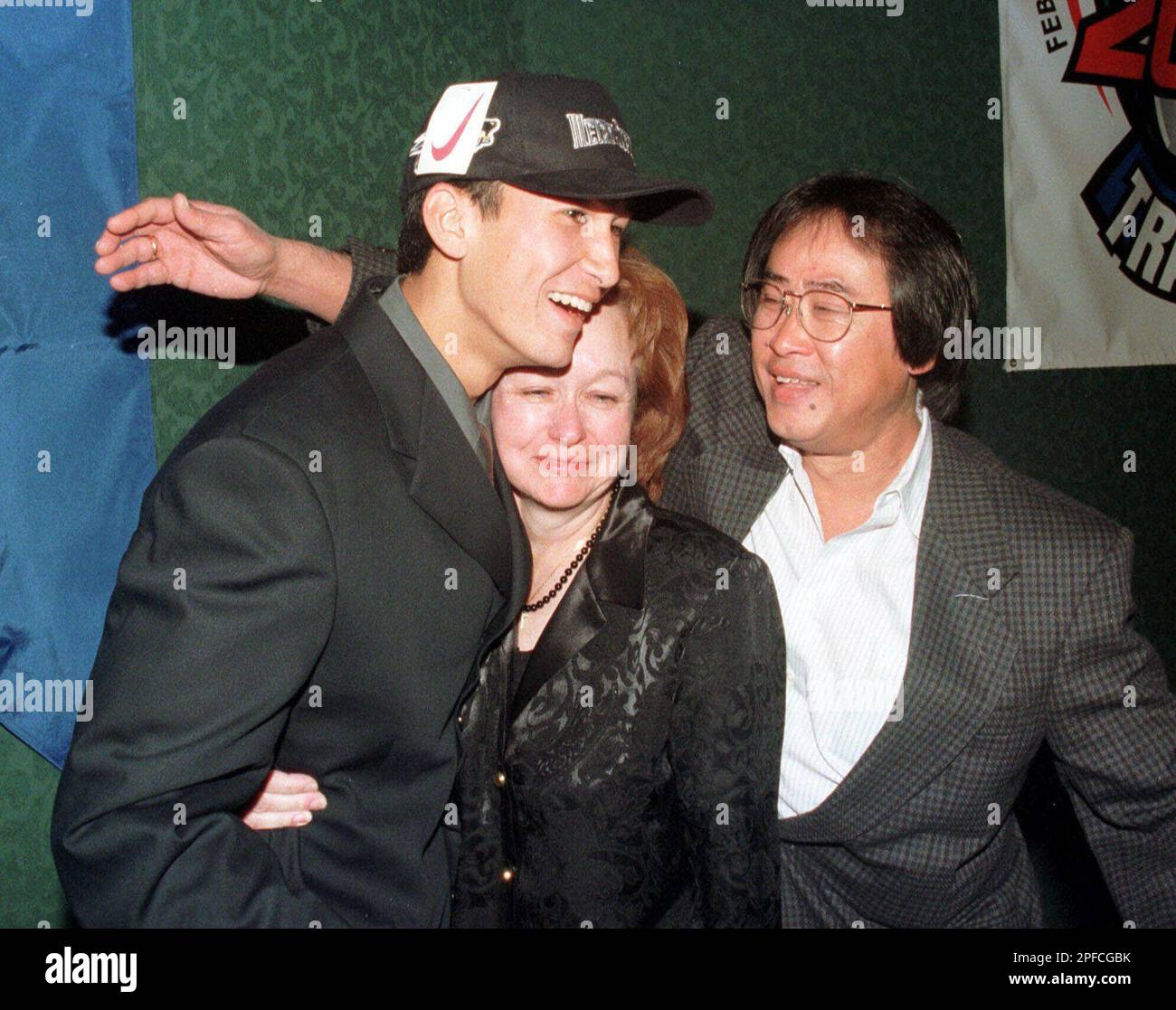 Steve Shak receives a hug form his mother, Loretta Shak and his father ...