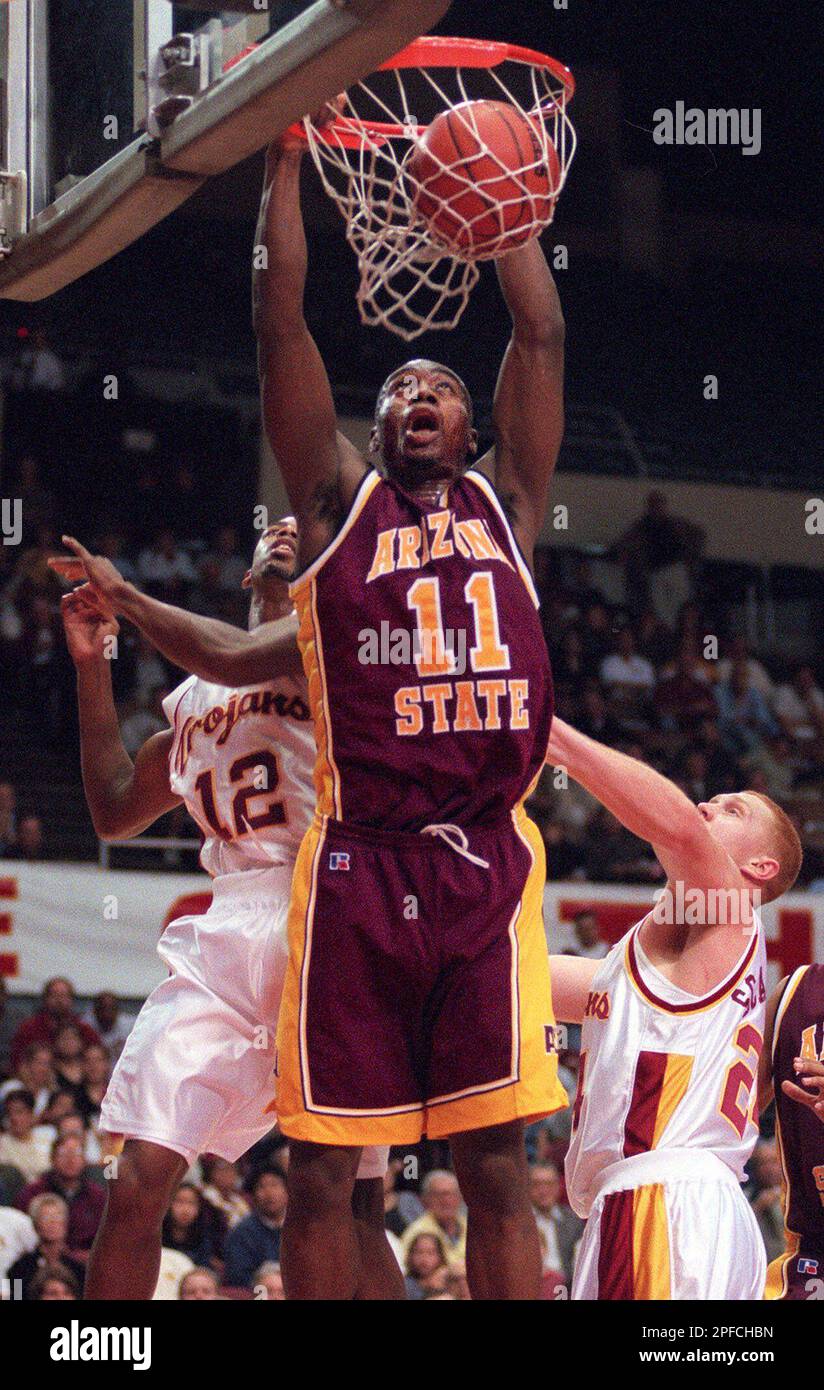 Arizona State's Awvee Storey (11) dunks in front of USC's Brian ...