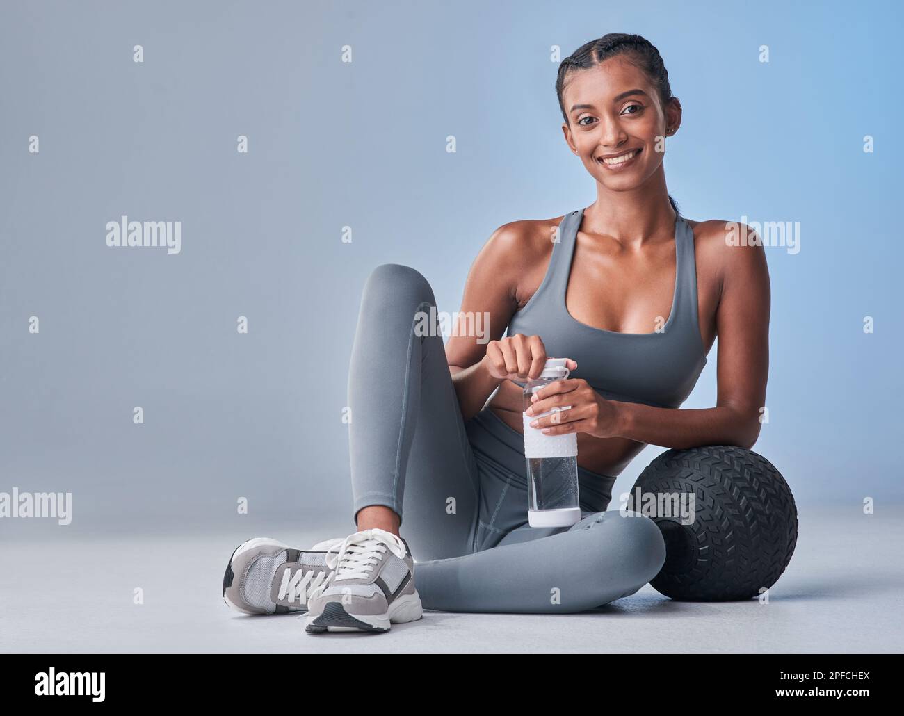 A fit life is a fulfilled life. Studio shot of a fit young woman ...