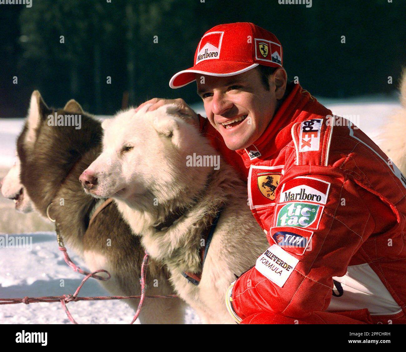 Ferrari driver Rubens Barrichello, of Brazil, poses with the sleigh ...