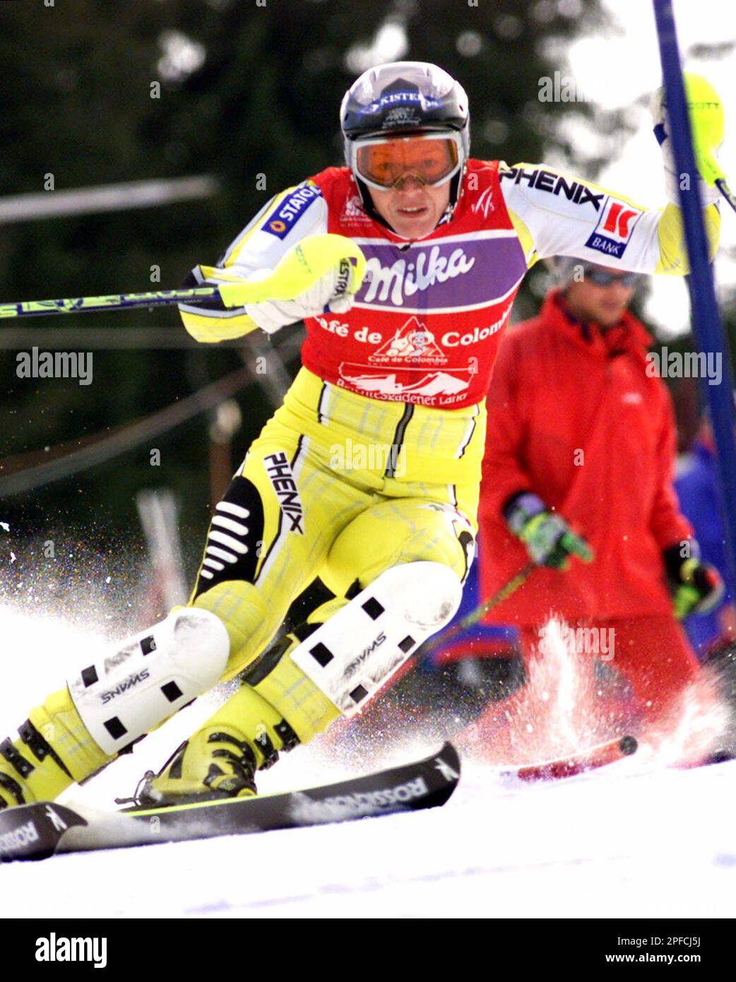 Trine Bakke of Norway skis through the gates of the first run of the ...