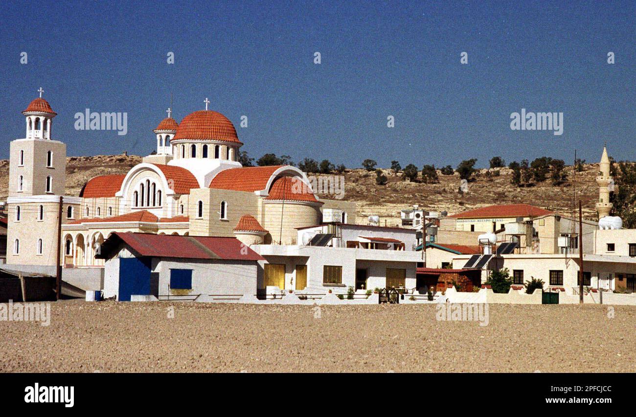 The Orthodox Christian Church, left, and the minaret of the Muslim ...