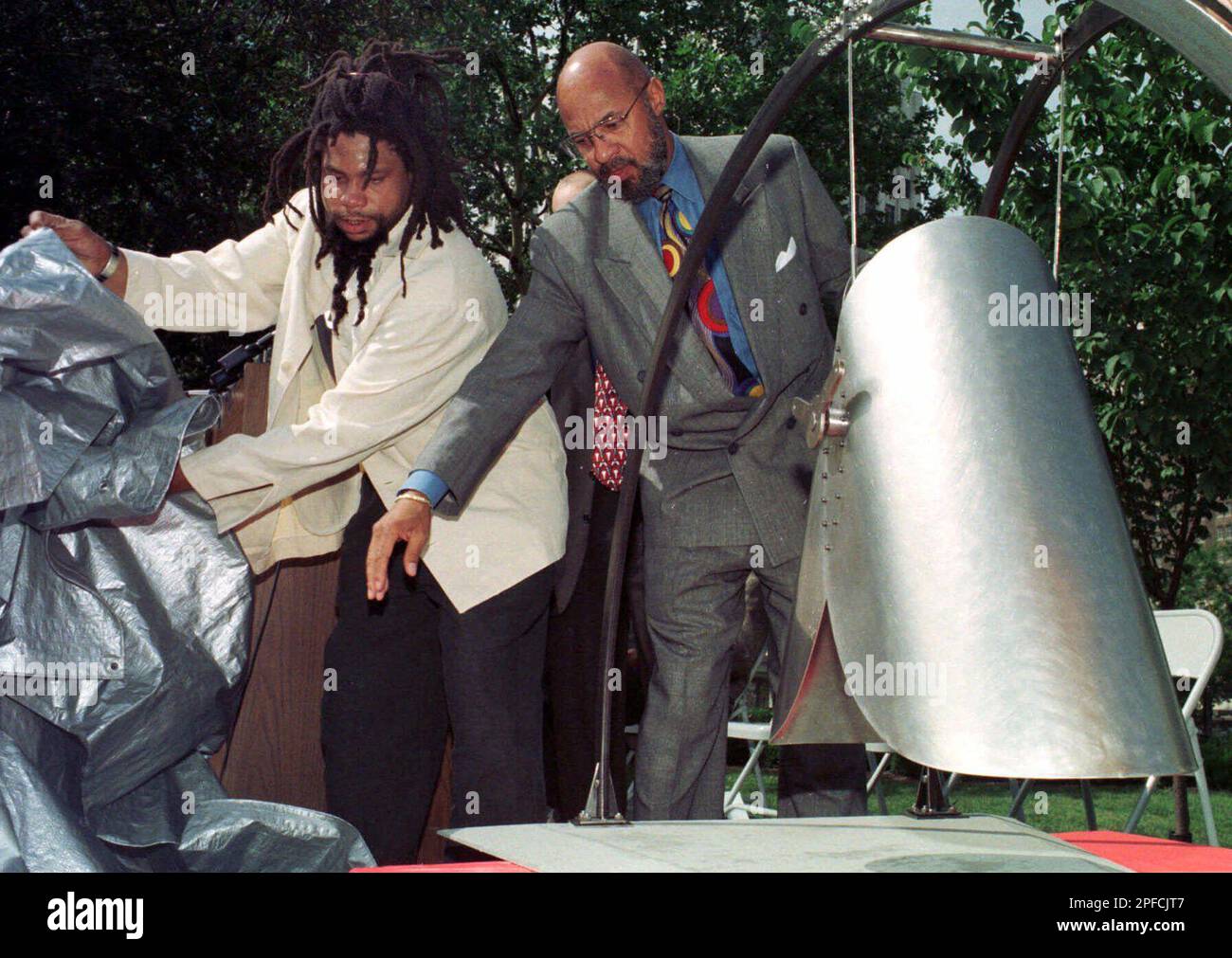 Metal Sculptor Christopher Turner, left, and Detroit Mayor Dennis ...