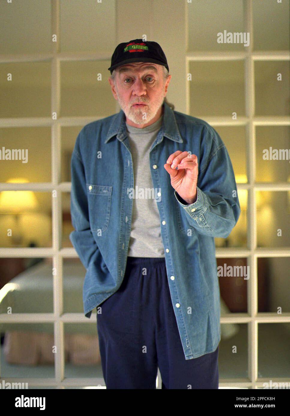 Comedian George Carlin poses in New York Oct. 26, 1999. Carlin's hippie ...
