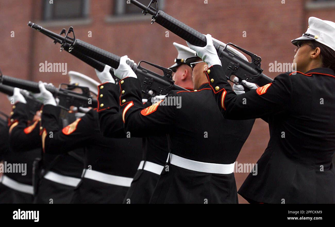 U.S. Marines from the 1st Batallion Alameda fire a 21 gun salute during ...