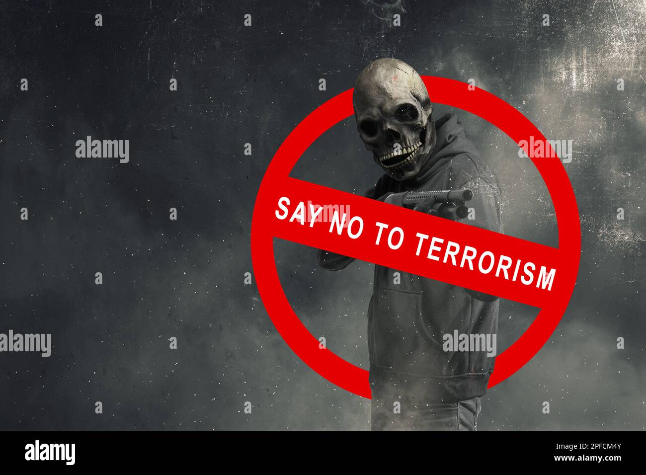 Man wearing a mask holding a gun with a stop terrorism sign in the dark ...