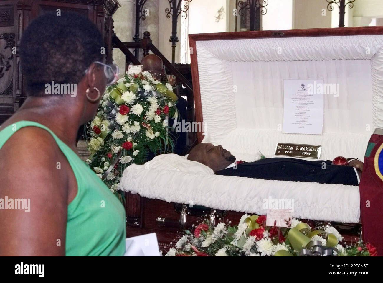 Anita Kennedy Adamson views the body of Malcolm Marshall at the St ...