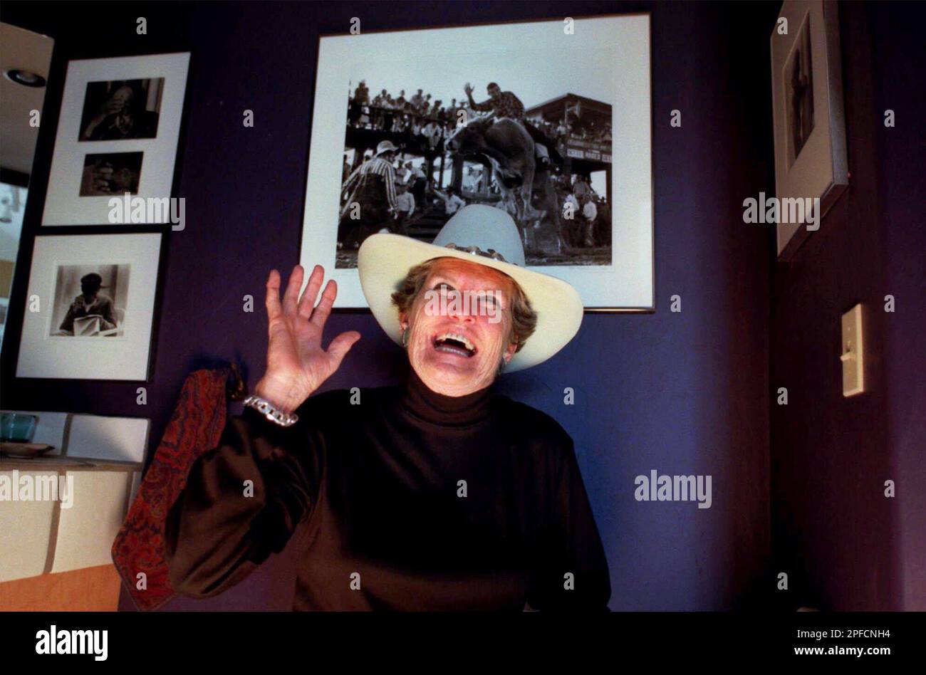 Famed rodeo photographer Louise Serpa laughs as she has her picture ...