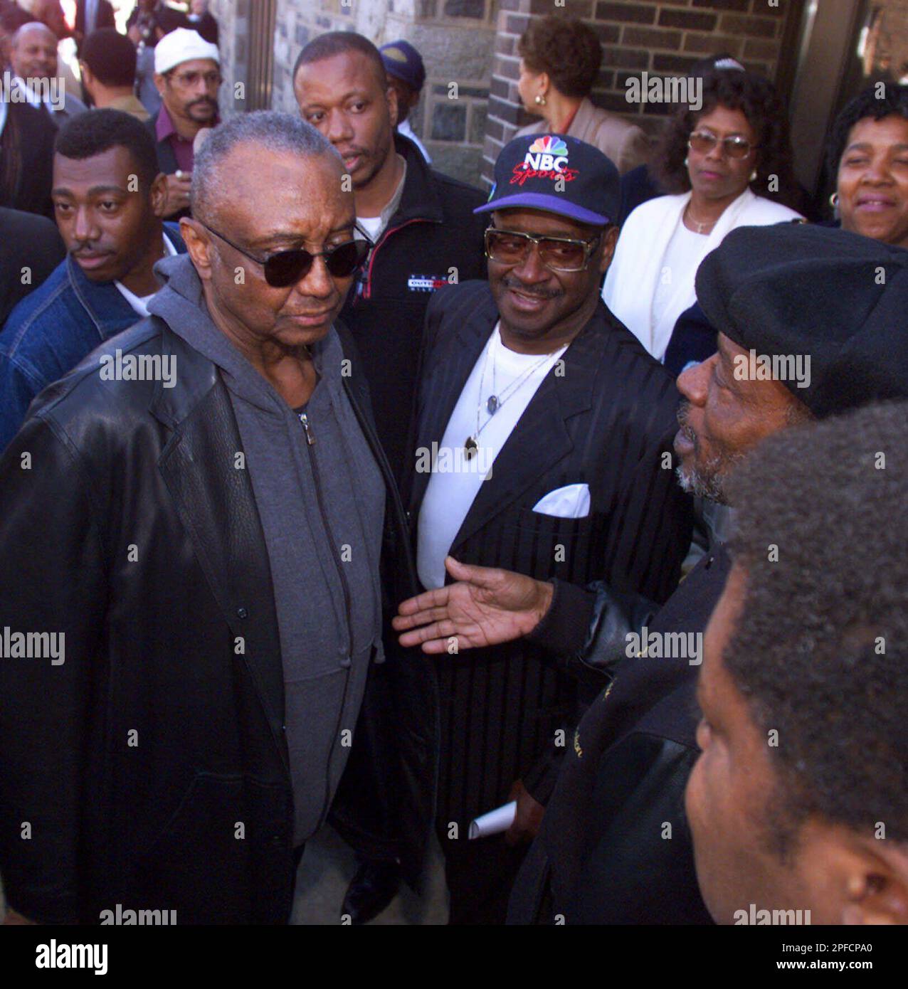 Temple coach John Chaney, left, leaves a West Philadelphia church where ...
