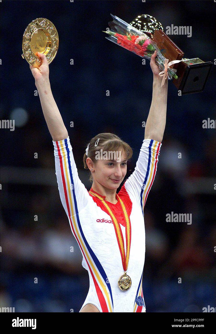 Romanian gymnast Maria Olaru celebrates her win in the women's all ...