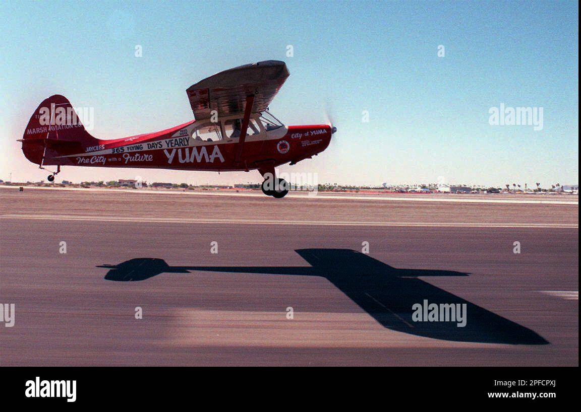 The City of Yuma, flown by Jim Gillaspie, casts its shadow on the ...