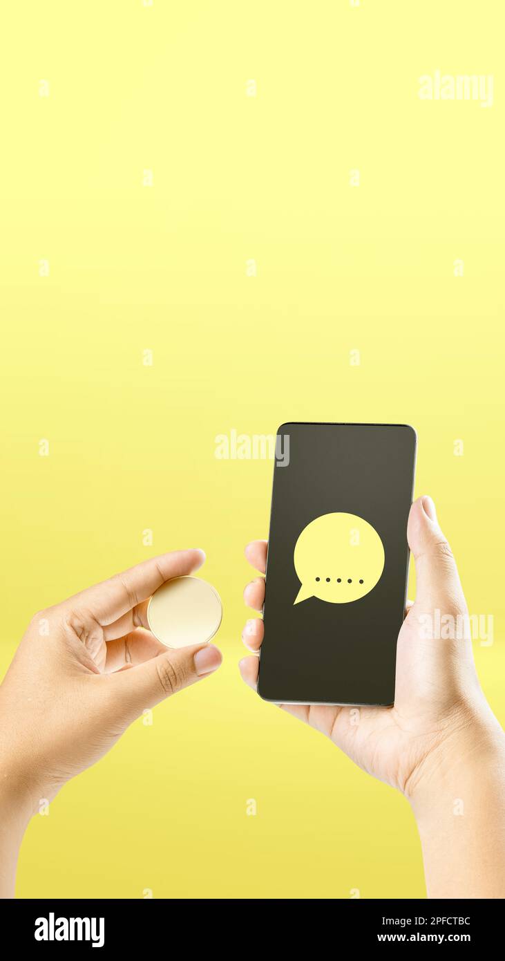Human hand holding mobile phone screen with message notification symbol ...