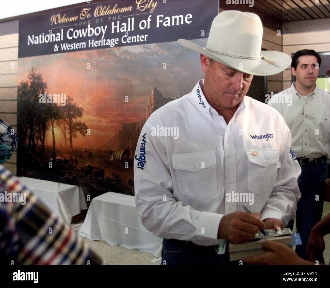 Baseball great Nolan Ryan signs autographs, Tuesday, Sept. 8, 1999, at ...