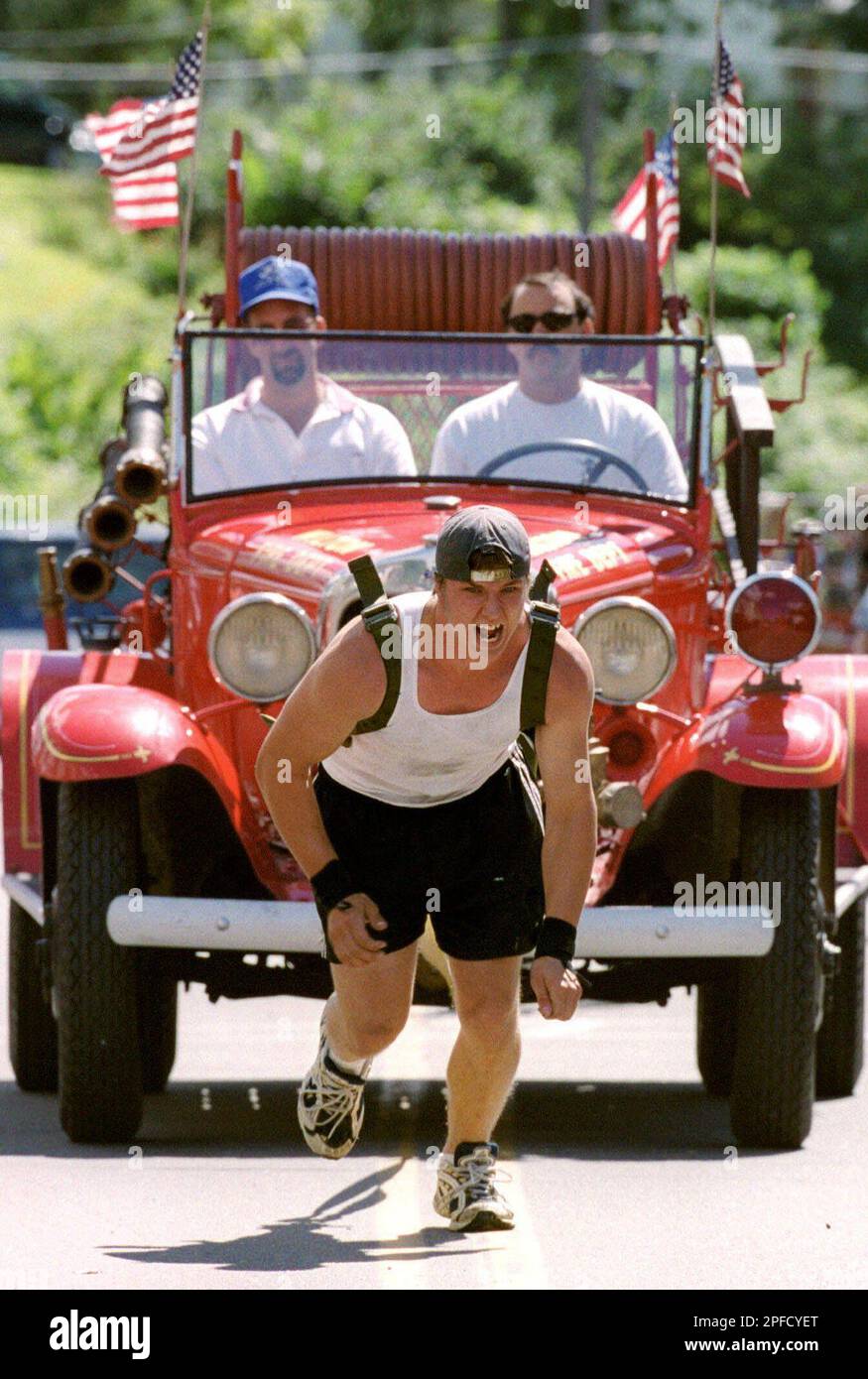Chris Sprague lets out a yell as he summons all his strength to get a ...