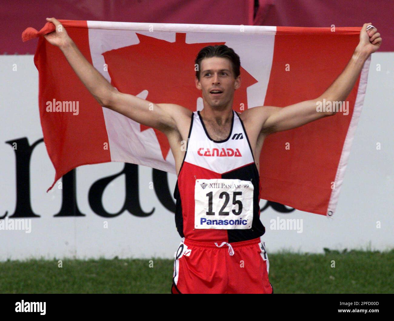 Graham Hood of Canada holds a flag after he won gold in the men's 1500 ...