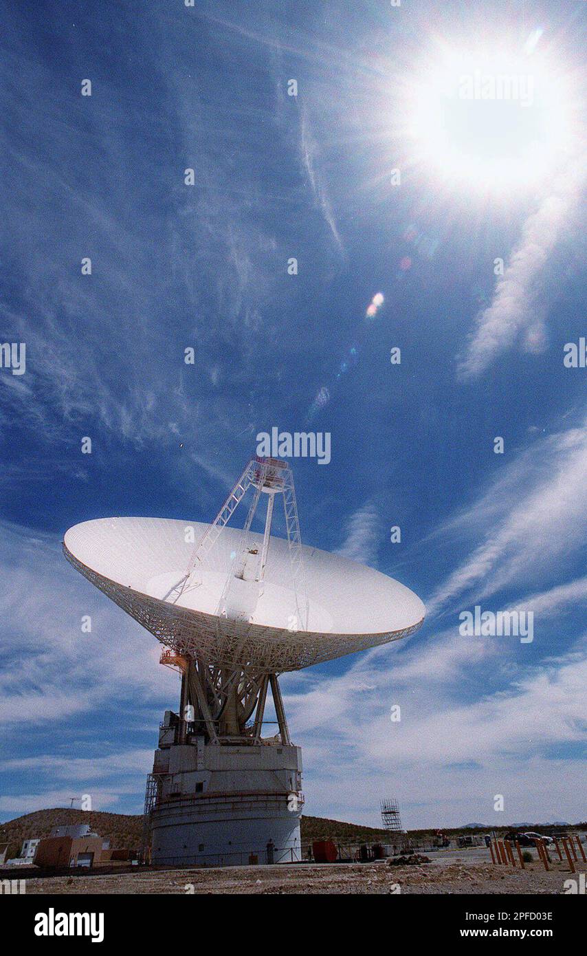 An antenna points to the desert sky at one of NASA's Deep Space Network ...