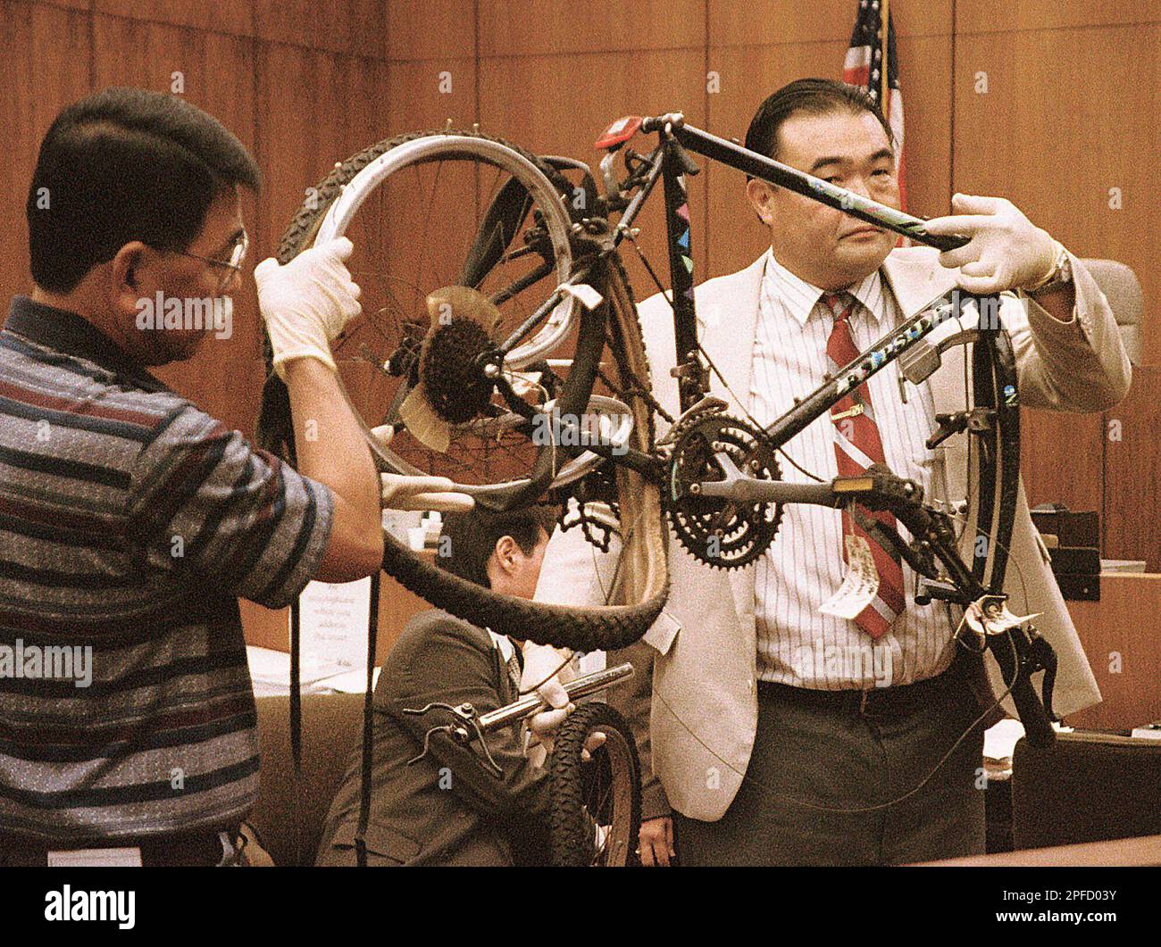 Lt. Edwin Tanaka, right, of the Hawaii County Police Department, and ...