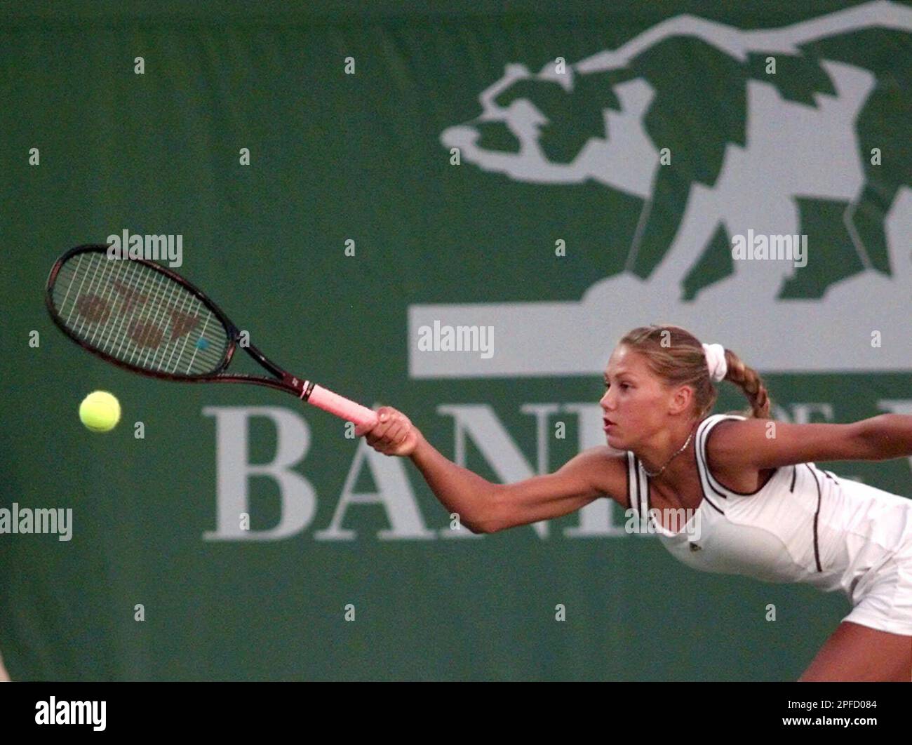 Anna Kournikova returns a shot to Mirjana Lucic in the Bank of the West ...